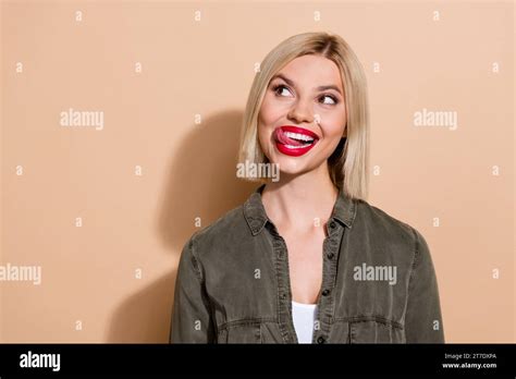 Photo Of Positive Tricky Woman Dressed Khaki Shirt Licking Lips Looking