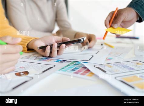Collaborative Ux Ui Design Process With Team Working On Mobile App Prototypes And Wireframes