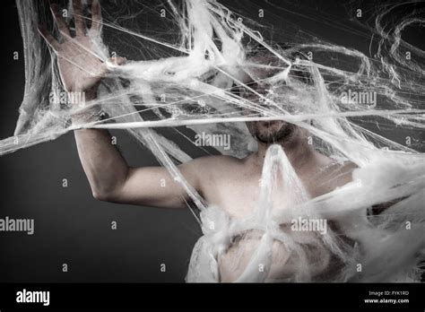 Connection Man Tangled In Huge White Spider Web Stock Photo Alamy
