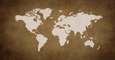 World Map On A Brown Textured Background Travel And Tourism Concept