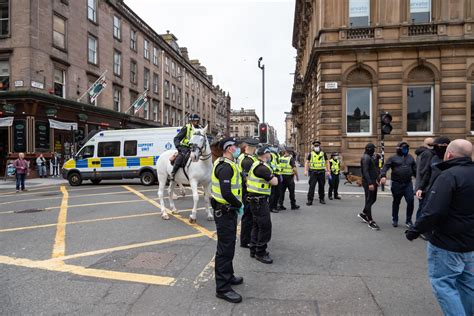 Photographer Targeted With Racist And Homophobic Abuse At Protest In