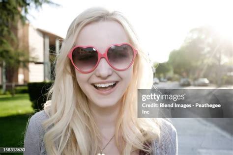 Red Heart Shaped Sunglasses Photos And Premium High Res Pictures