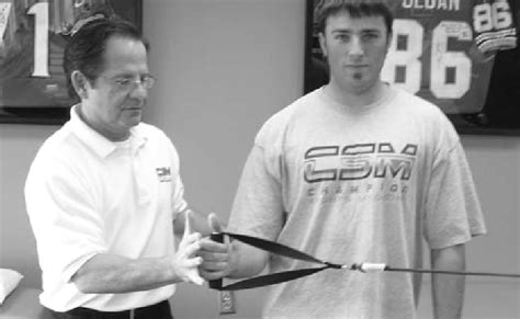 External Rotation With Tubing While The Therapist Applies An External