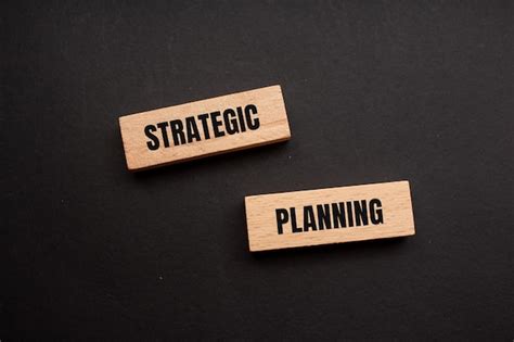 Premium Photo Strategic Planning Message Written On Wooden Blocks