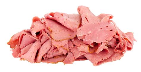 Thinly Sliced Lamb With Garlic On A Cutting Board With A Knife For Meat