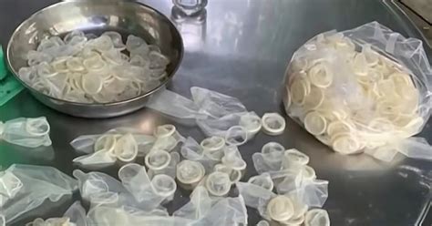 Police Raid In Vietnam Finds More Than Used Condoms Being Packed For Resale Cbs News