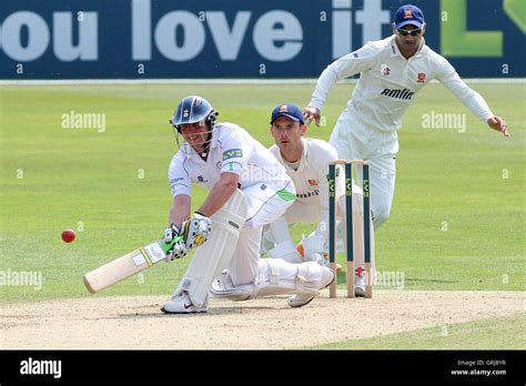Wes Durston Of Derbyshire Plays The Sweep Shot As James Foster Looks On