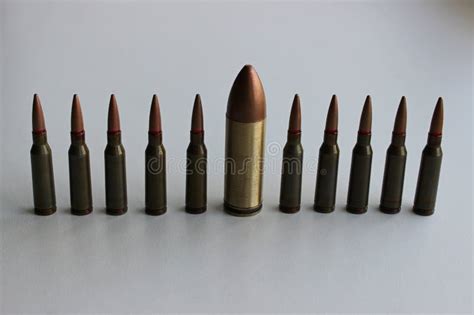 conceptual photo on the theme of diversity with a large bullet in a row
