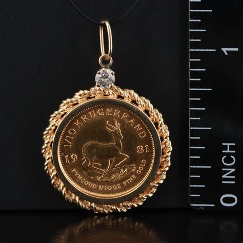 14k 0 11 Ct Diamond Pendant With 1 10th Ounce Krugerrand Coin Ebth