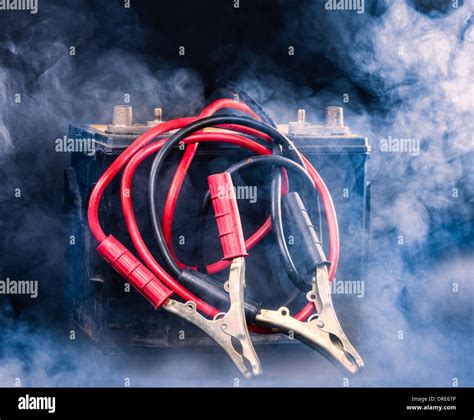Old Car Battery And The Jumper Cables Smoky Environment Stock Photo Alamy