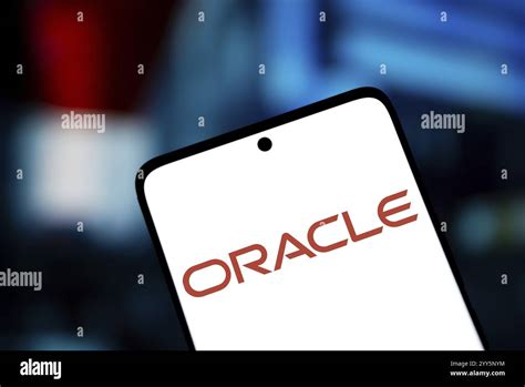 Oracle Logo Is Diaplayed On Smartphone Oracle Corporation Is An American Multinational Computer