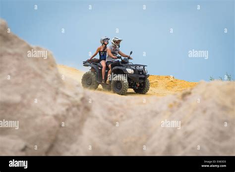 People Enjoy Hot Weather And Bathe In The Mud Pool With Kaolin In