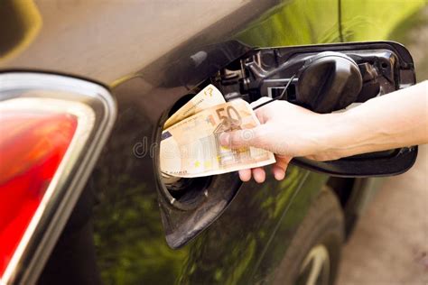 Transportation Expenses Concept Euro Money In Car Fuel Tank Stock