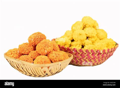 Orange And Yellow Marigold Known As Gende Ka Phool In Basket Tokri