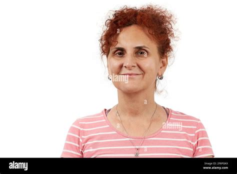 Closeup Portrait Of A Curly Redhead Woman Isolated On White Background