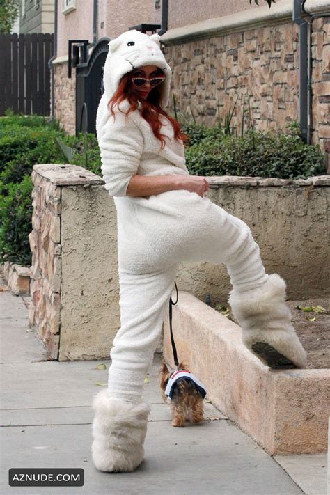 Phoebe Price Wearing A Cat Jumpsuit With Red Lingerie Underneath In