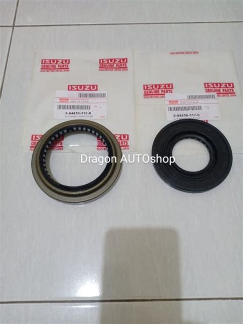 Oil Seal Roda Belakang Luar Dan Dalam Nkr66 Nkr71 Lazada Indonesia