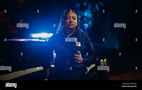 Professional Black Female Police Officer Looking At The Camera