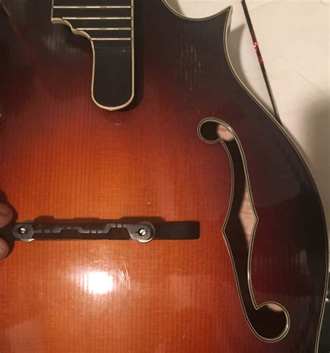 First Lesson For Mandolin Players How To Put On The Bridge