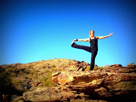 Woman Doing Balancing Yoga Pose Extended Hand To Big Toe Yoga Pose