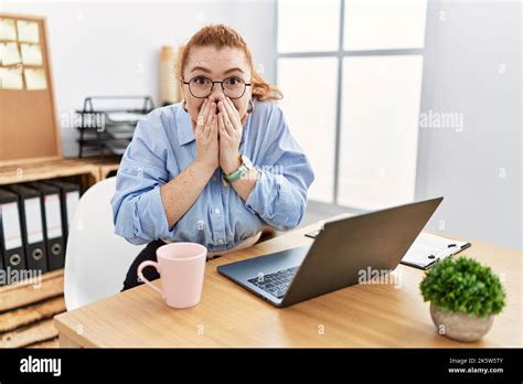 Young Redhead Woman Working At The Office Using Computer Laptop