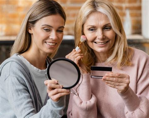 Free Photo Smiley Women Getting Their Make Up On At Home