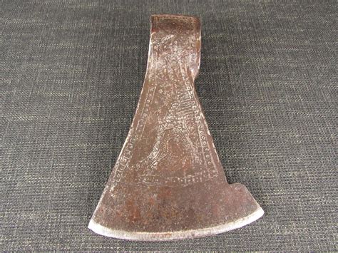 Decorated Axe Head With Wolf Headed Snake SOLD