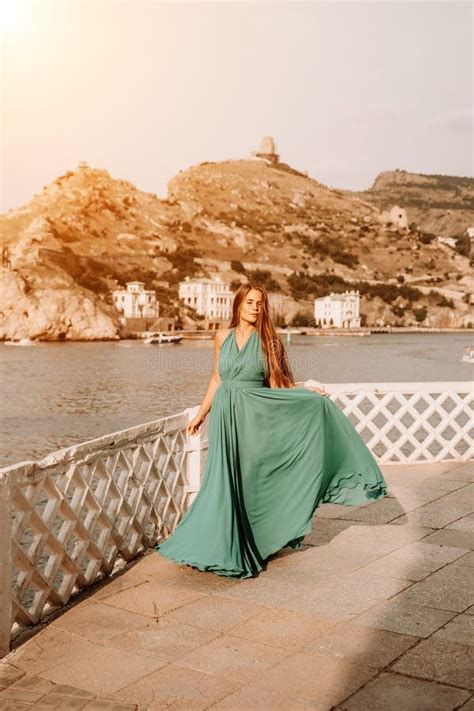 Woman Sea Trevel Green Dress Side View A Happy Woman With Long Hair In