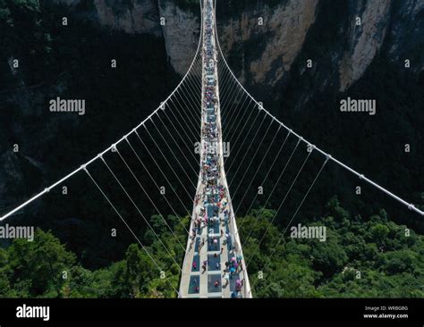 In This Aerial View Tourists Brave The Worlds Longest And Highest