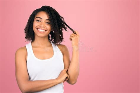 Black Girl Playing With Her Hair Looking At Camera Stock Image Image