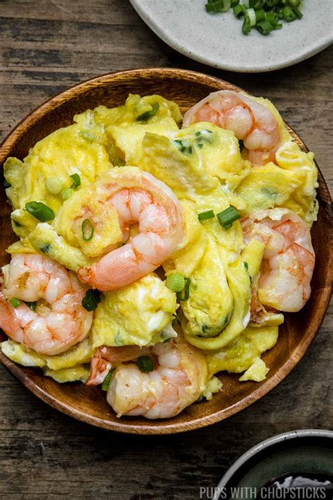 Chinese Scrambled Eggs And Shrimp Pups With Chopsticks