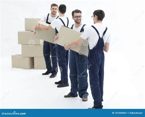 Photo Workers Pass Each Other Boxes When Moving Flats Stock Image