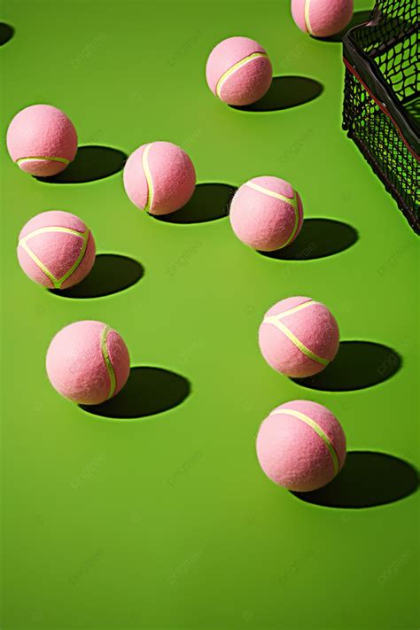 Green Tennis Balls On A Green Tennis Court Background Wallpaper Image
