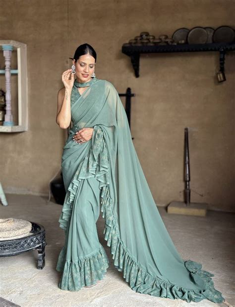 Most Beautiful Designer Ruffle Saree In Faux Georgette With Un Stitched
