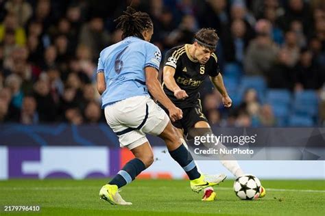 Nathan Ake Of Manchester City F C Tackles The Opponent During The