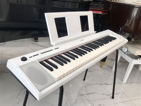 Piano Yamaha Mini NP12 - ST Music