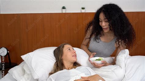 Cheerful African Woman Using Cucumber Sliced Treatment Skin Care