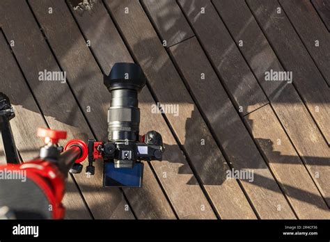 a camera held by an articulated arm to easily move it to any position