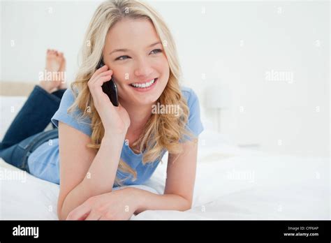 Woman Looking To The Side As She Makes A Phonecall Stock Photo Alamy