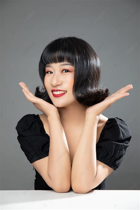 Portrait Of Beautiful Woman Smiling During Daytime Indoors With Open