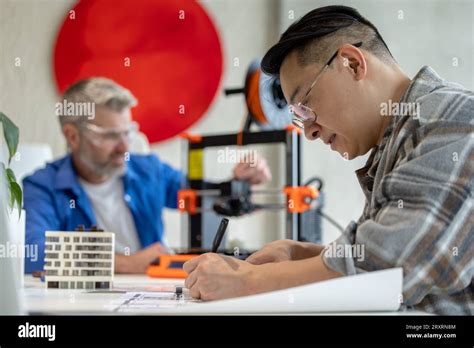architects making house model using 3d printer fdm technology for