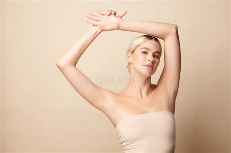 Beautiful Young Woman Lifting Hands Up To Show Off Clean And Hygienic