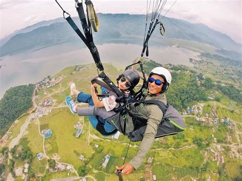 情侣去巴厘岛旅游就应该在情人崖体验滑翔伞，在天空对她说我爱你 知乎