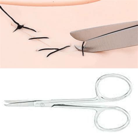 Cutting Edge Suture Scissors Slicing Through Surgical Threads Like Butter