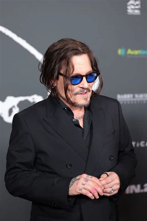 Johnny Depp Looks Completely Unrecognizable With Wispy Gray Hair