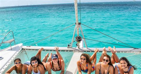 Cancún Catamaran Party to Isla Mujeres with Buffet and Bar GetYourGuide
