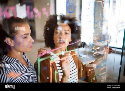 Programmers Cooperating At It Company Developing Apps Stock Photo Alamy