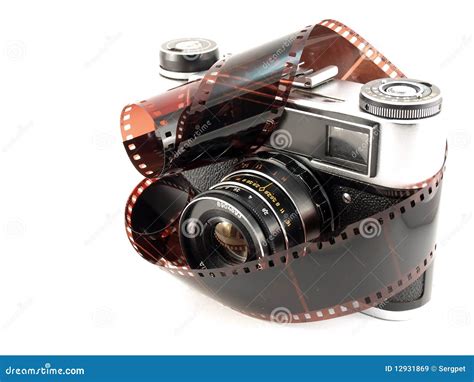 Alte Film-Kamera mit Film stockbild. Bild von ausrüstung - 12931869