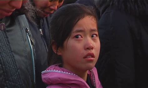 How To Understand All Those Photos Of North Koreans Crying Over Kim