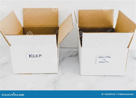 Decluttering Concept Storage Boxes To Sort Between Objects To Keep And Those To Declutter Or